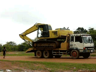 Excavator Getting Off Truck | Best Funny Gifs Updated Daily